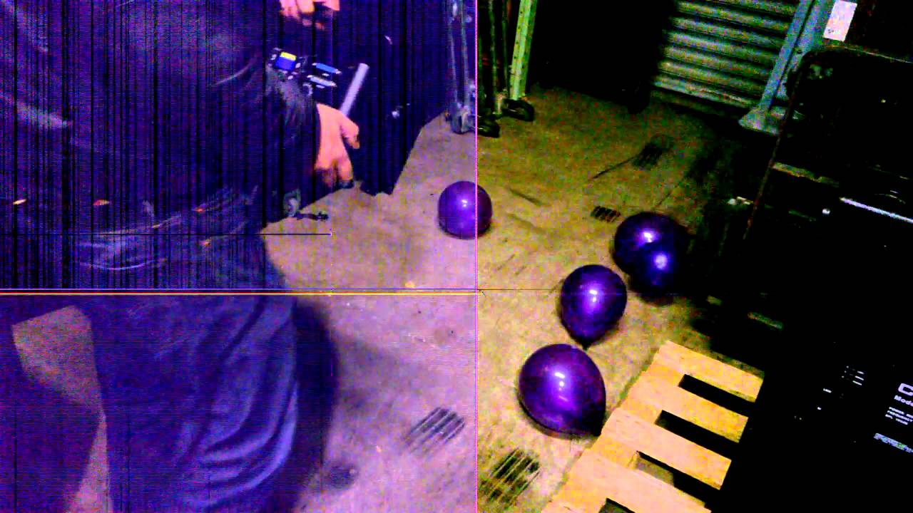 popping balloons with a 5W laser - YouTube