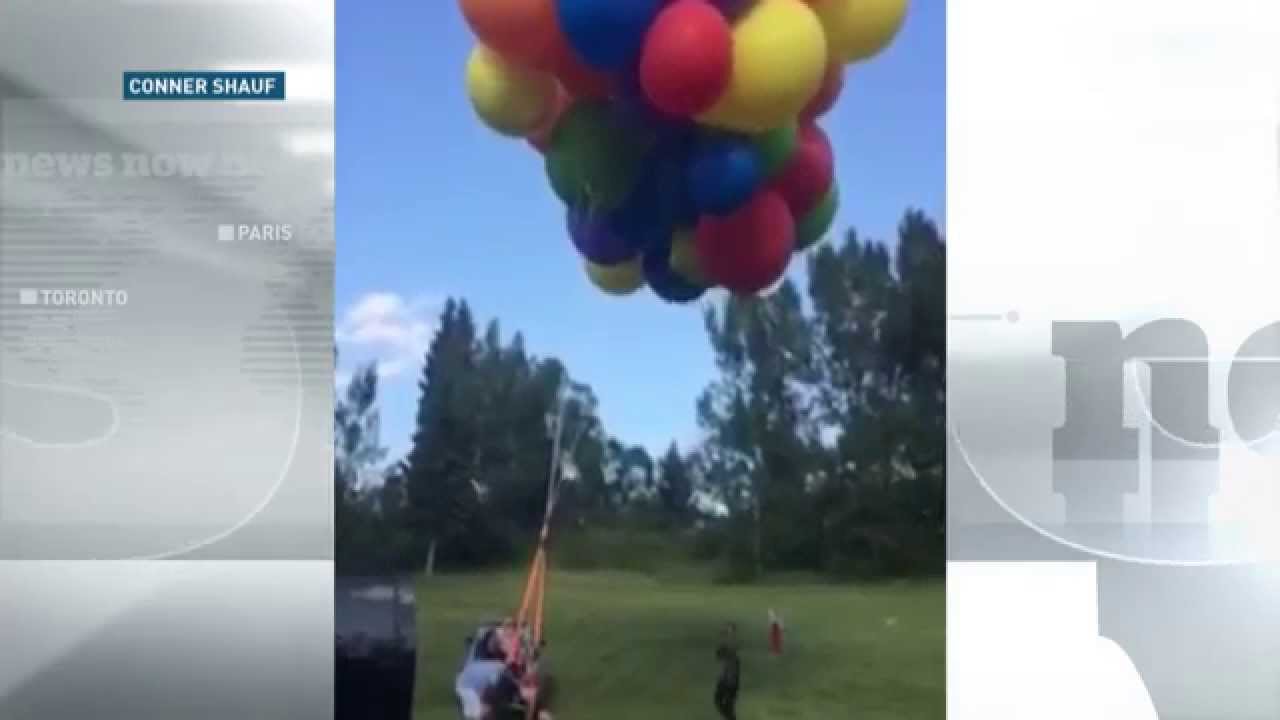 Up in the air: Calgary man soars in lawn chair attached to helium ...