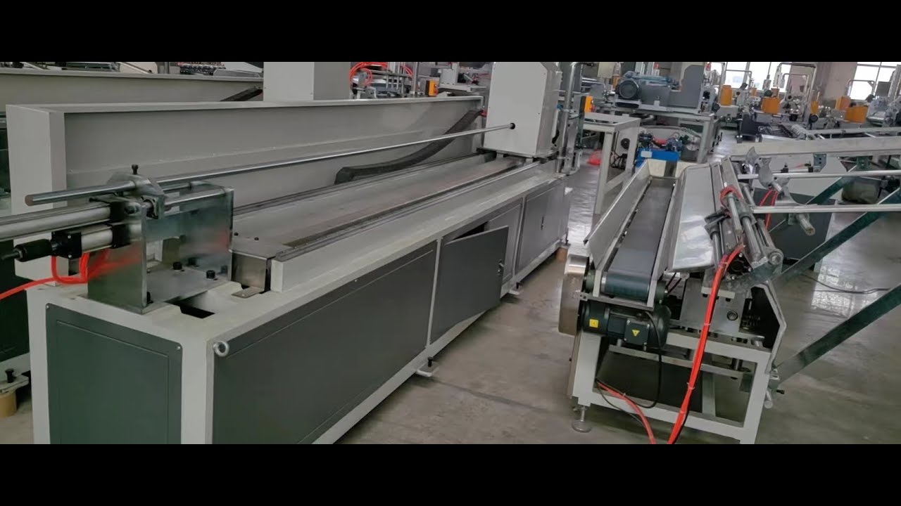 Fully automatic shaftless paper tube fine cutting machine - YouTube