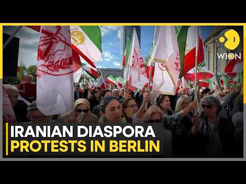 Iranians Protest In Germany: Reza Pahlavi Targeted With Red Liquid | WION
