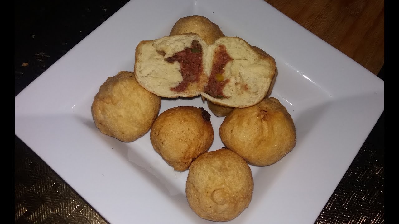 Cornbeef Filled Fried dumplings from debbie dung a yaad - YouTube