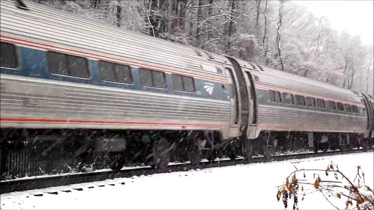 Amtrak during First Winter Snowfall - YouTube
