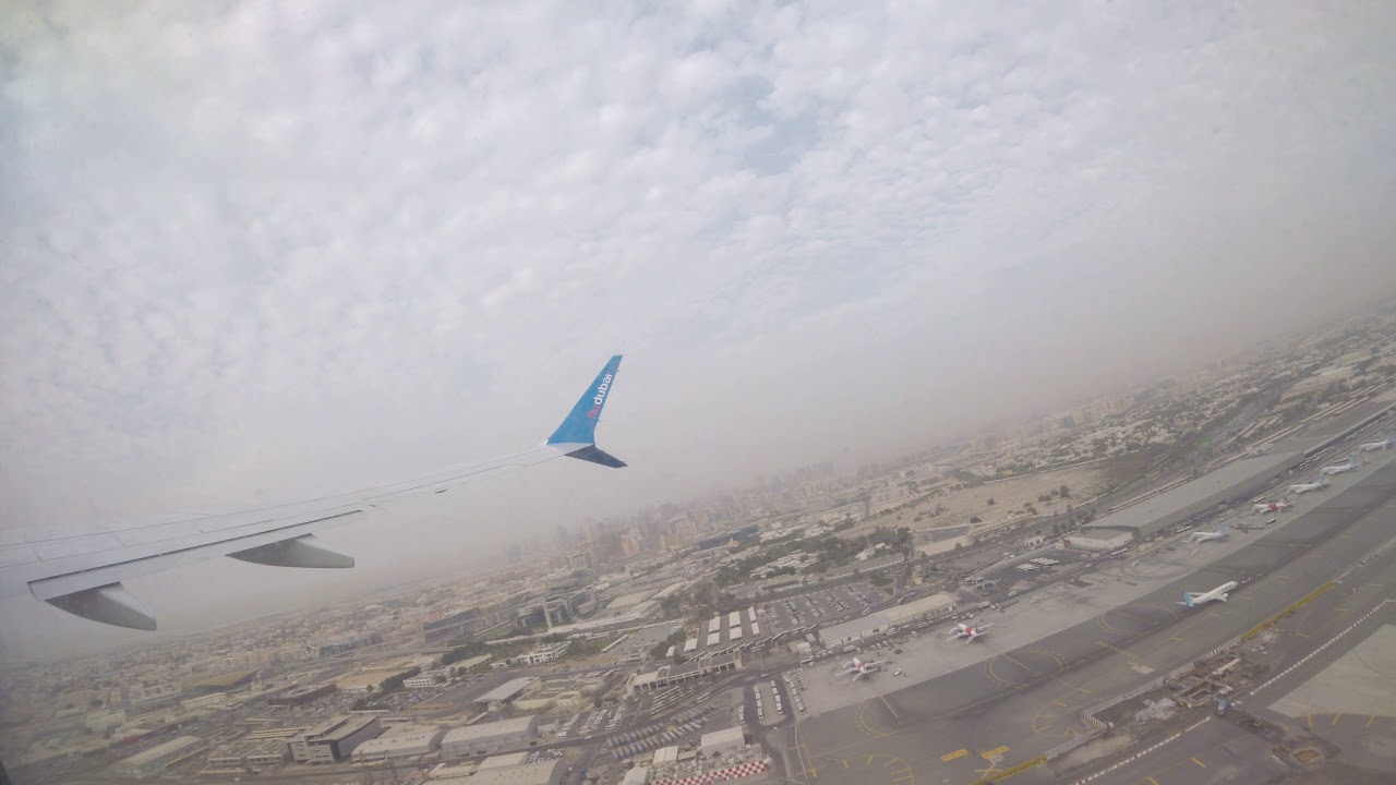 Take off aircraft FlyDubai inside airport Dubai. - YouTube