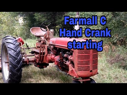 Farmall C hand crank starting , a cold start by hand. - YouTube
