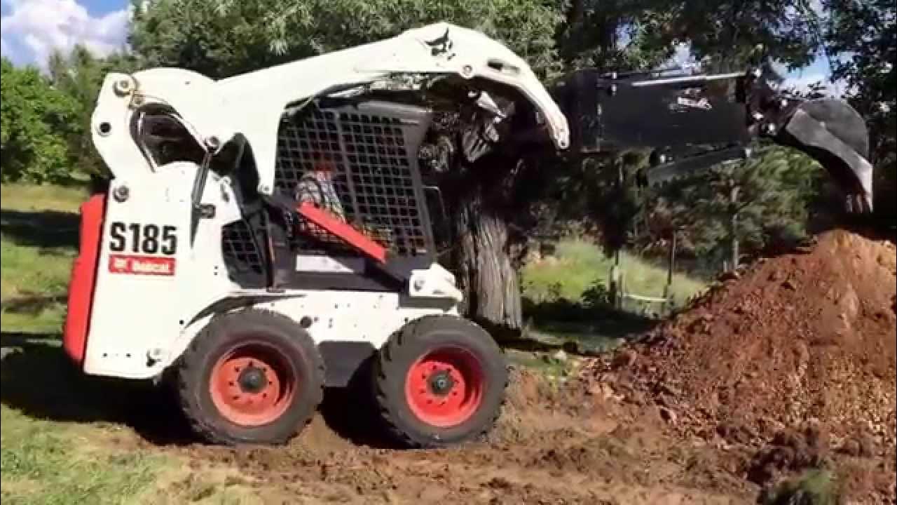 Digging a 6 foot water line trench with my s185 and a Skid Pro stiff ...