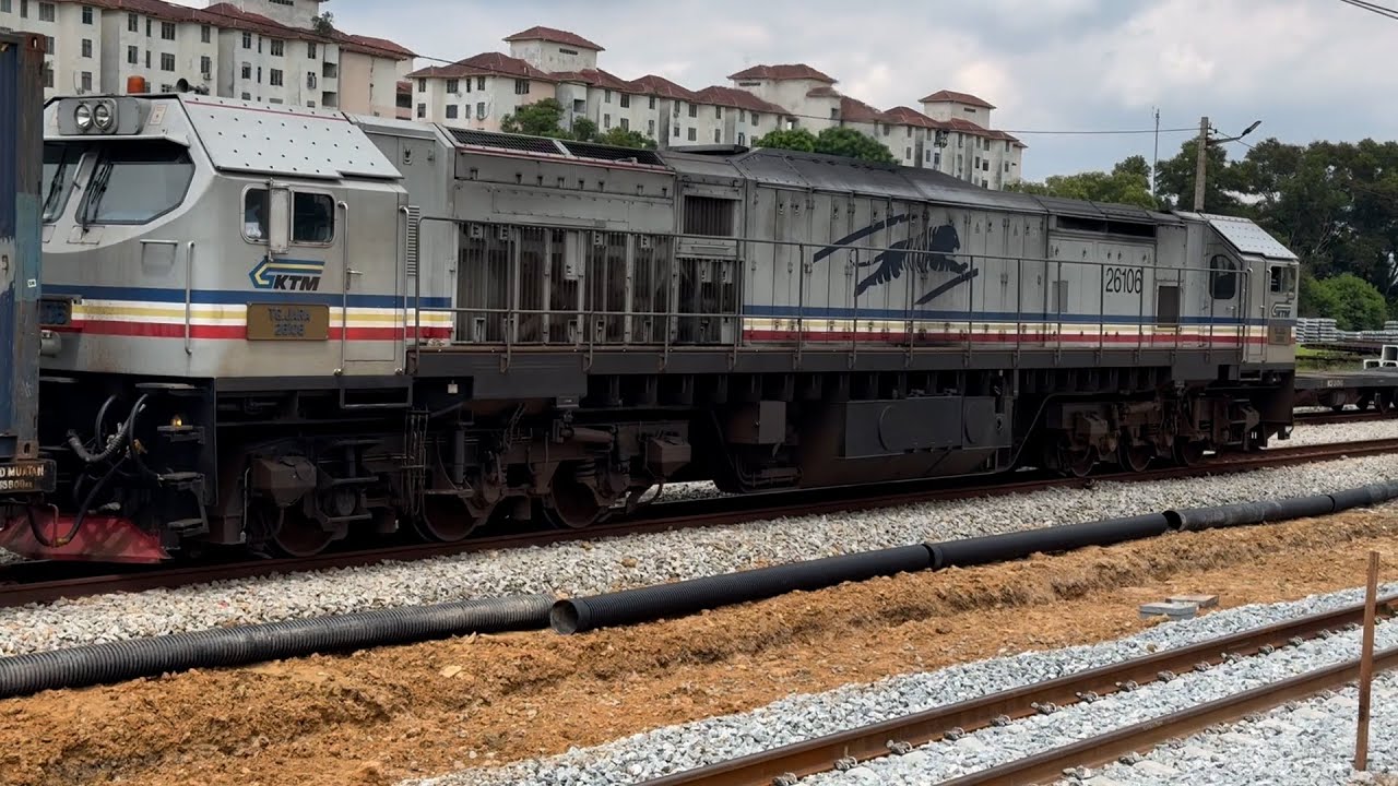 KTMB Class 26106 Tanjung Jara locomotive with container and flatbed ...
