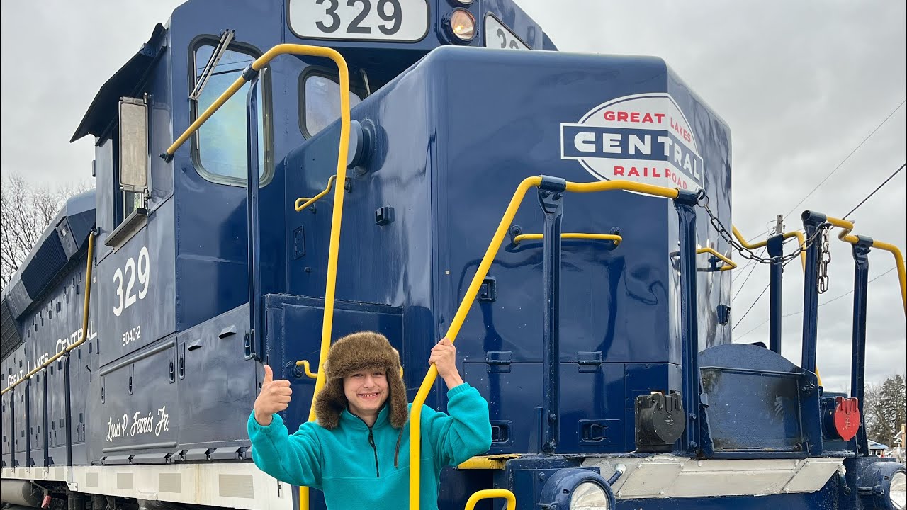 GLC Great Lakes central railroad backing up for pictures - YouTube