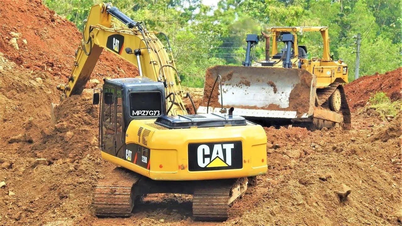 CAT Dozer Excavator Dump Trucks Building New Road On The Limestone Hill ...