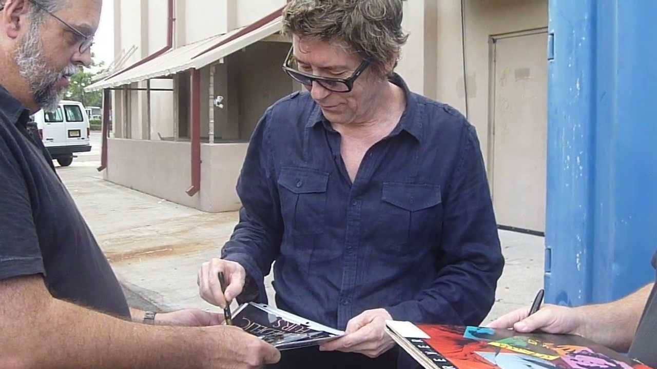 Psychedelic Furs lead singer Richard Butler signing autographs ...