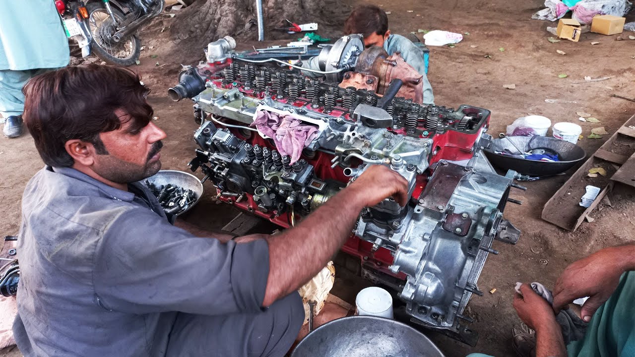 This Man Is Expert In Repairing Truck Engine Rebuilding Truck Engine ...