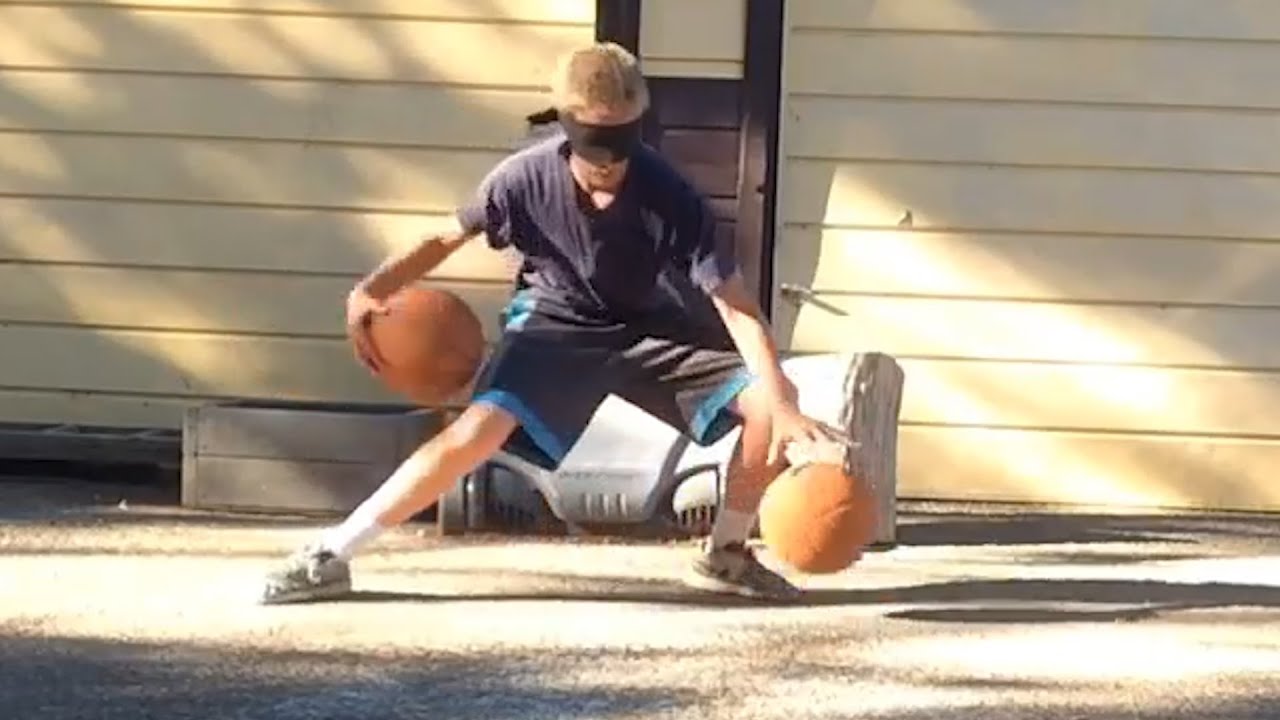 Blindfolded teenager can dribble a basketball better than all of us ...