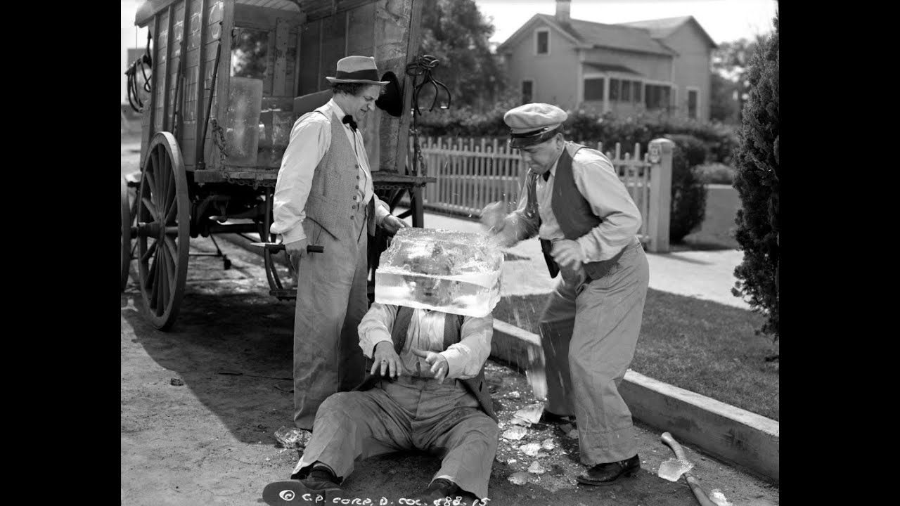 The Three Stooges delivering ice up the stairs in An Ache In Every ...