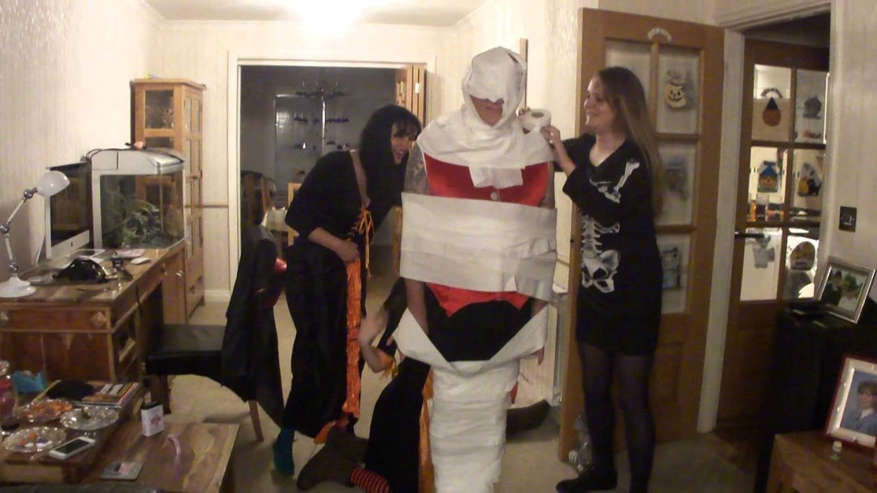 Halloween mummy wrapping with the Roberts - YouTube