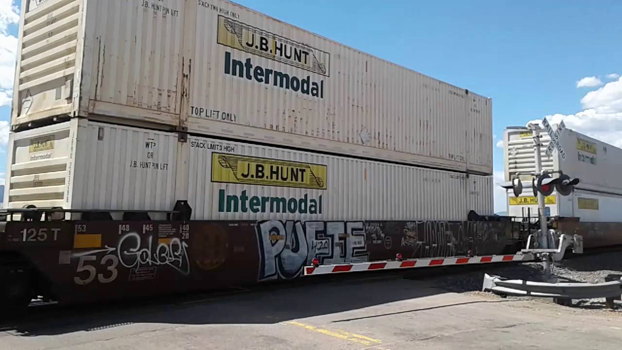 BNSF intermodal double stack train starting to move - YouTube