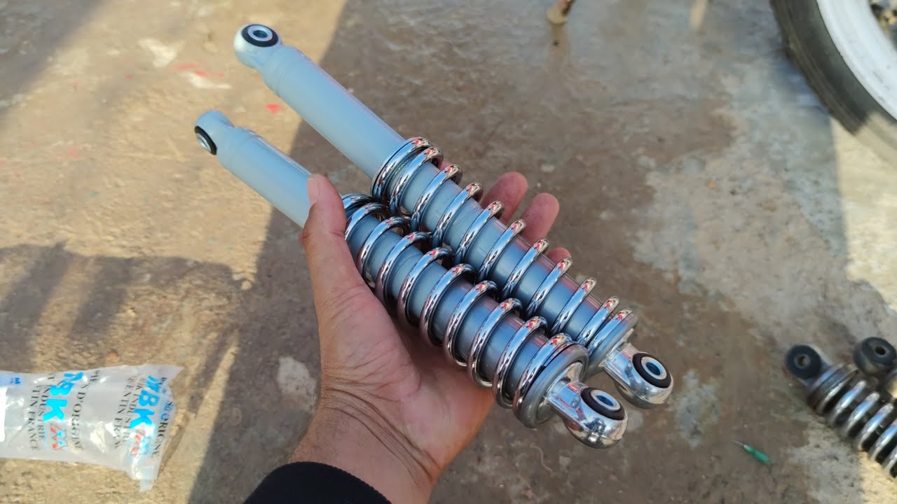 The correct way to change motorcycle springs - YouTube