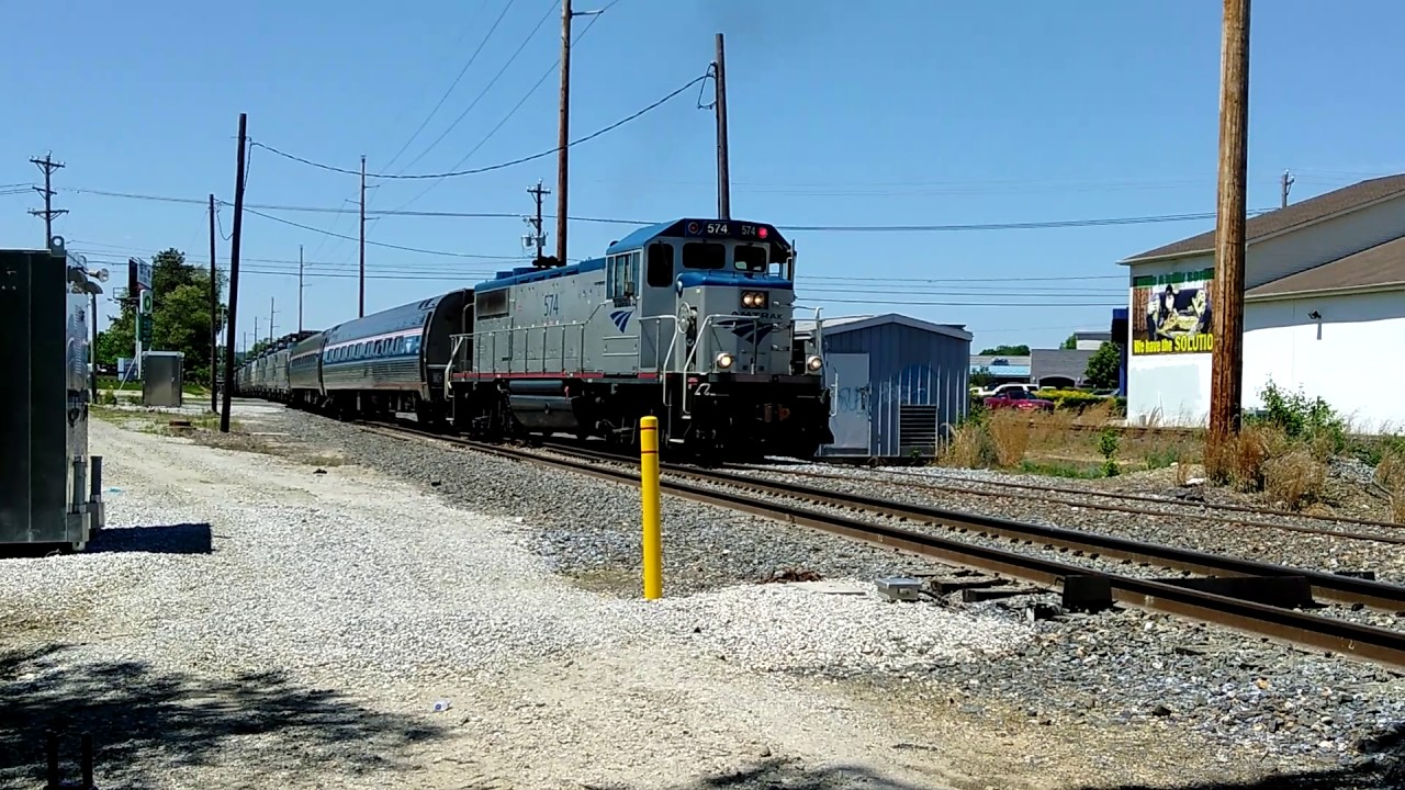 Amtrak KP 701 delivering the AEM-7'S to bear car shops - YouTube