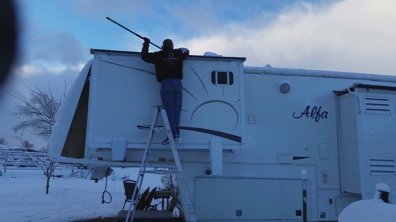 Our 1st Snow/Sweeping the slides & roof! - YouTube