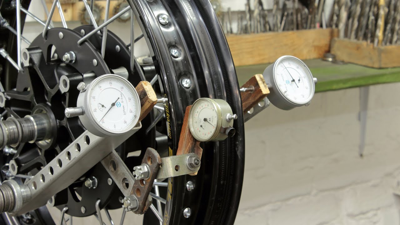 Spoked wheel truing: why to use two dial gauges for axial runout. - YouTube