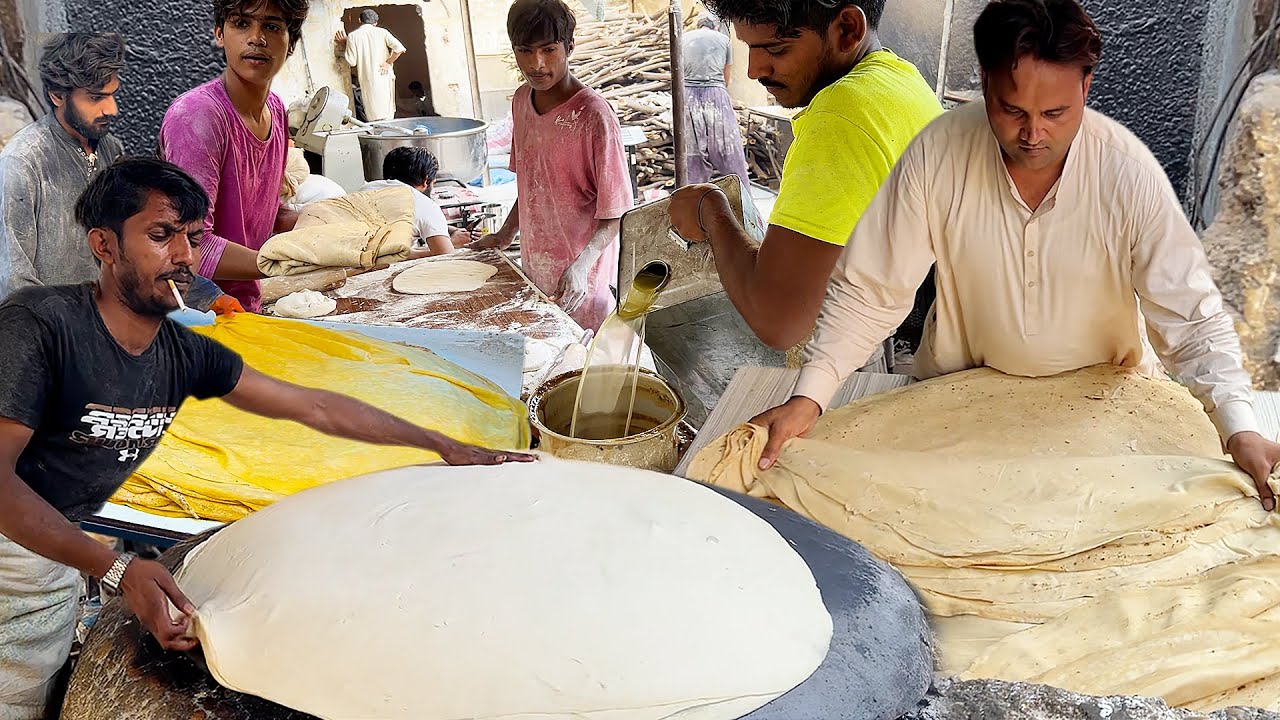 PAKISTAN'S EXTRA LARGE RUMALI ROTI | Manda Roti Factory Making | Roll ...
