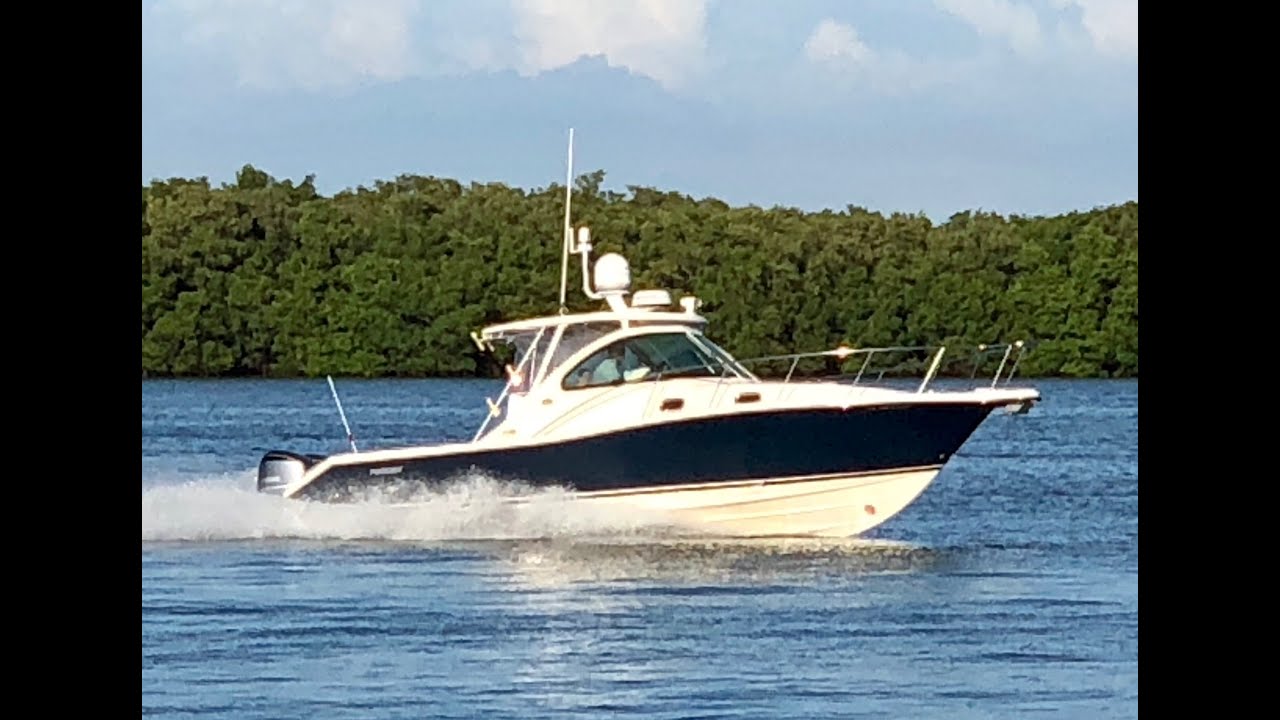 2007 Pursuit 335 OS - YouTube