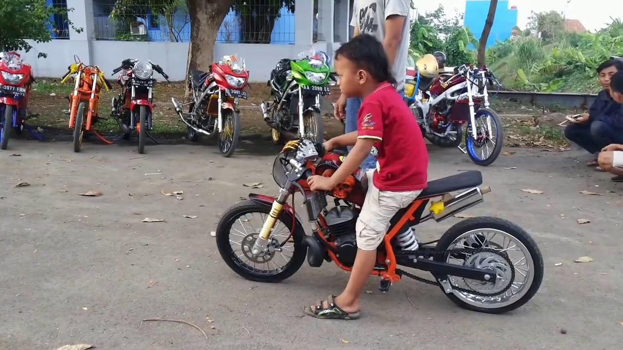 Little boy riding a mini motorcycle - YouTube