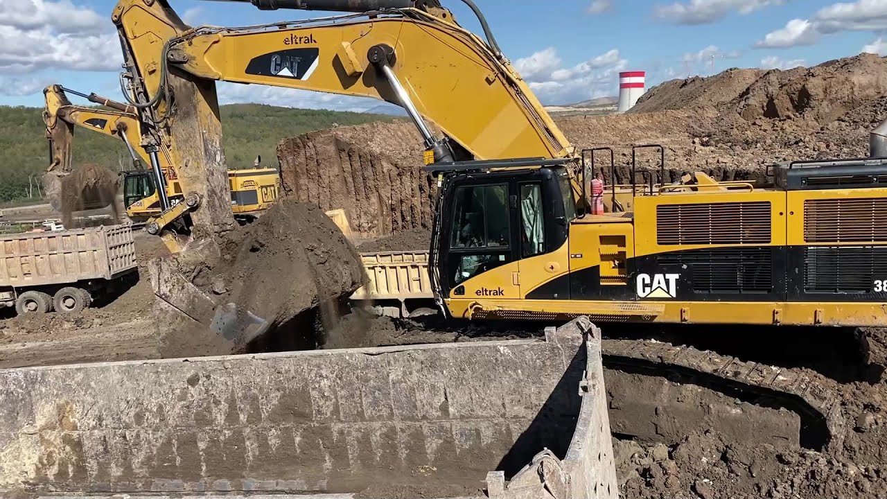 Two Caterpillar 385C Excavators Loading Mercedes And MAN Trucks - Ektor ...
