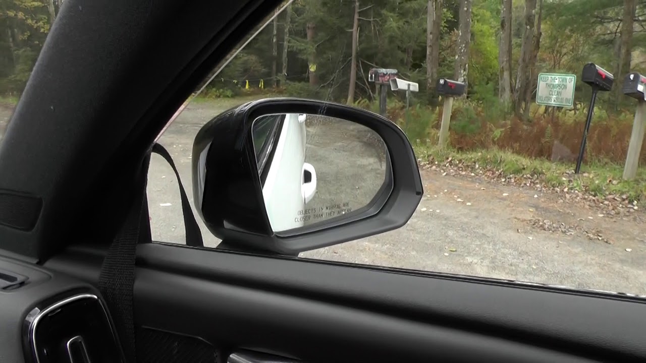 2019 Volvo XC40 has automatic power angle side view mirror - YouTube