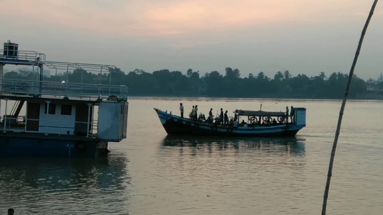 The first ferry boat of the day arrives - YouTube