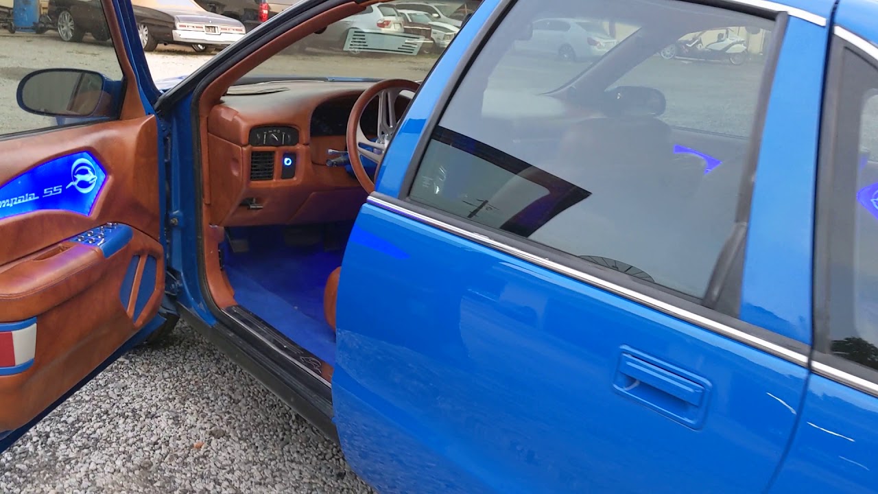Stitched by slick 96 Impala custom interior - YouTube