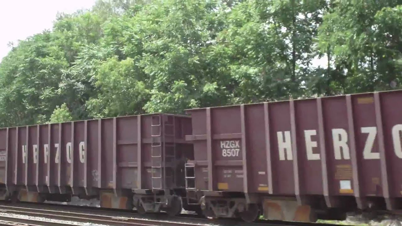 Herzog ballast train thru Elmira,NY July 2010. - YouTube
