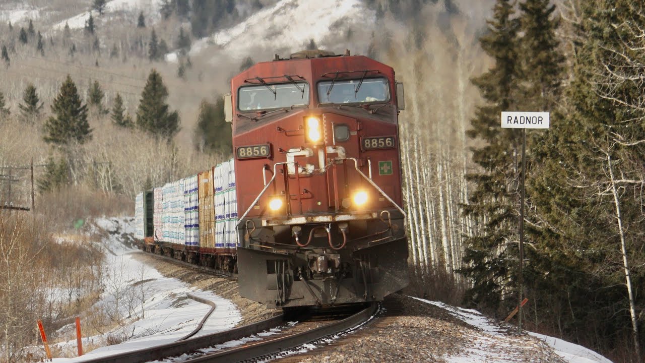 VERY FAST!!! CP 8856, CP 8559, and CP 9378 lead CP 200 east near Ghost Lake, Alberta - YouTube