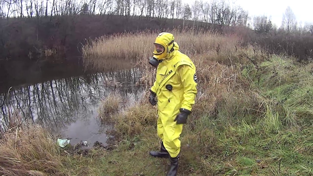 Yellow Chemicalsuit TRELLCHEM by the water stream - YouTube