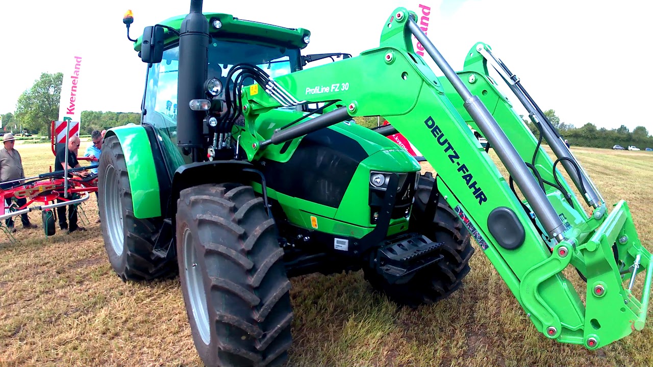 Deutz-Fahr Tractor With ProfiLine Front Loader And Kverneland Tedder ...
