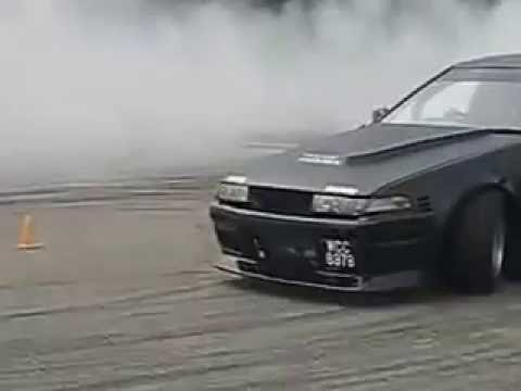 Modified Nissan Cefiro A31 1UZ V8 engine drifting donuts - YouTube