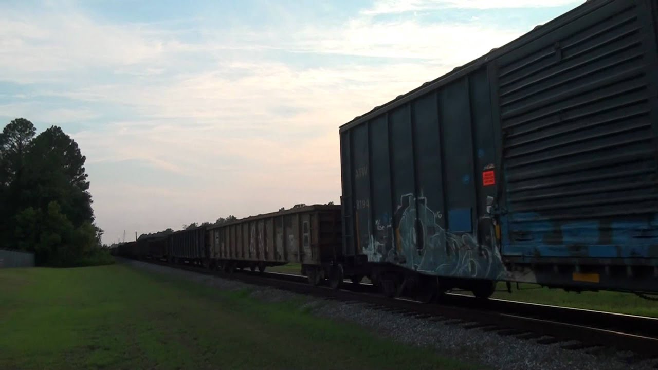 Bayline railroad evening manifest train leaves Panama City Florida ...
