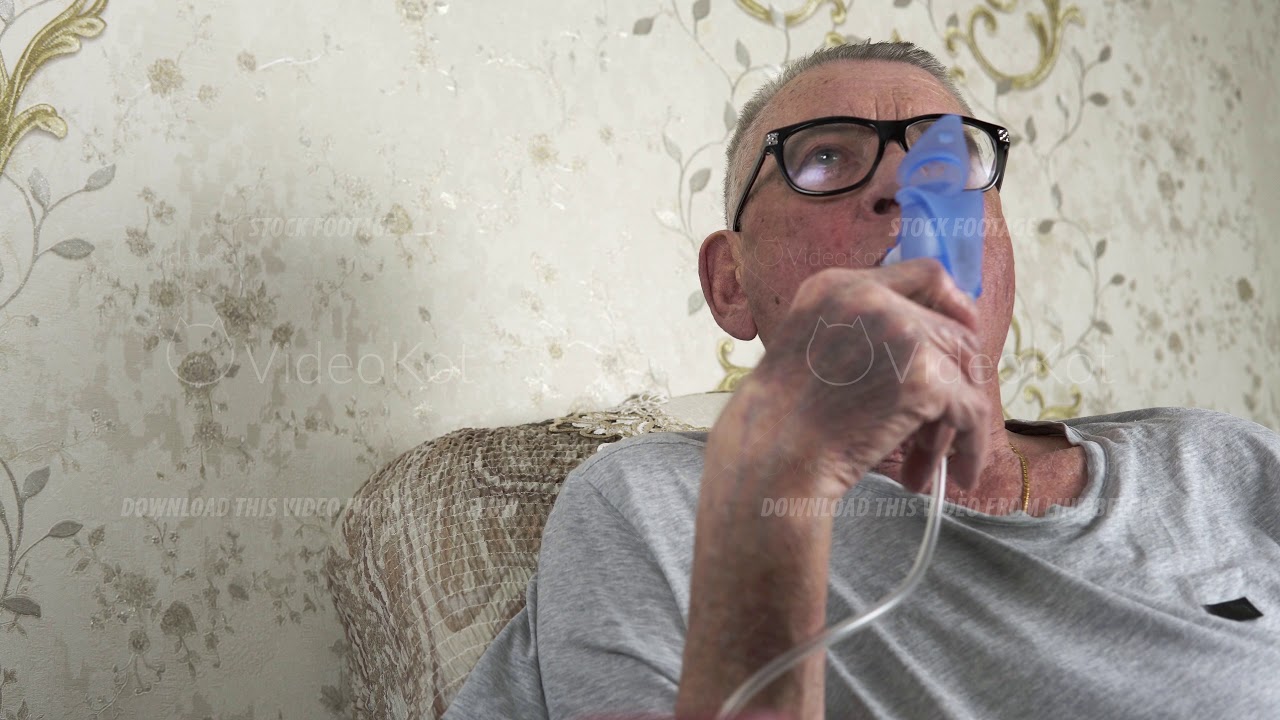 Elderly man does medical therapy steam inhalation at home - YouTube