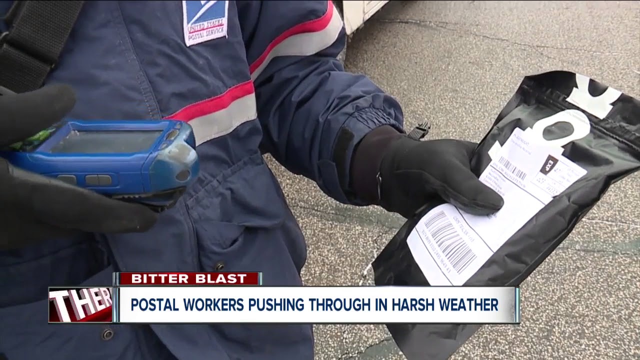 Postal workers battle cold to deliver mail - YouTube