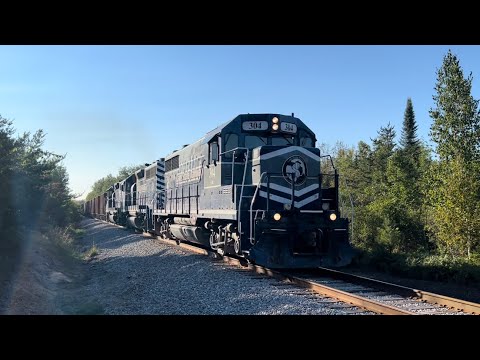 LSRC 304, LSRC 4304, and LSRC 4306 head south through Ossineke Michigan with Train 326S behind ...