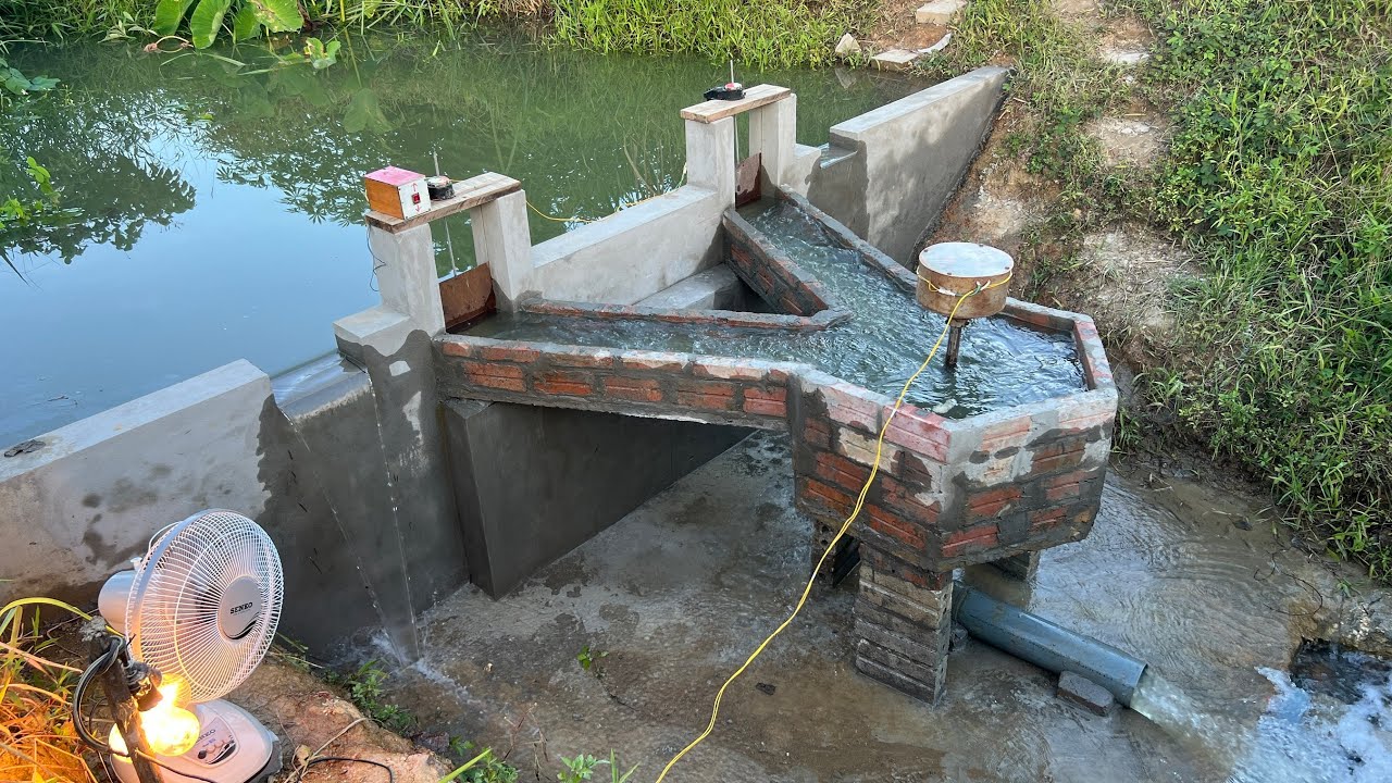 Building a mini 220V hydroelectric dam with unique turbines - YouTube