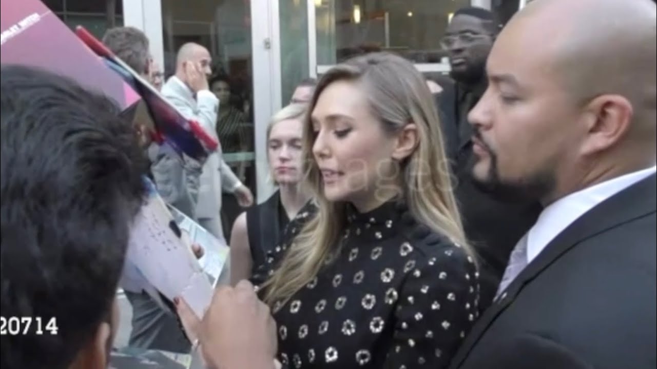 Elizabeth Olsen signing autographs - YouTube