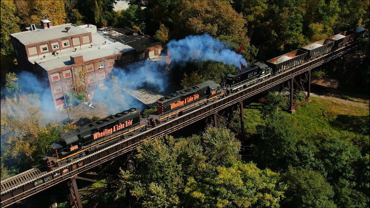W&LE 3048 stone train at Akron Ohio plus National Stone's GP35 Wheeling ...