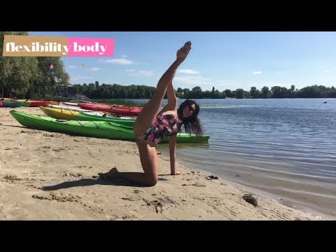 flexibility yoga in the beach