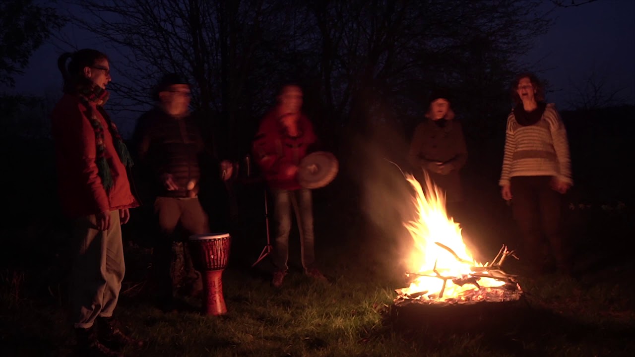 Singing Together at the Fire - YouTube