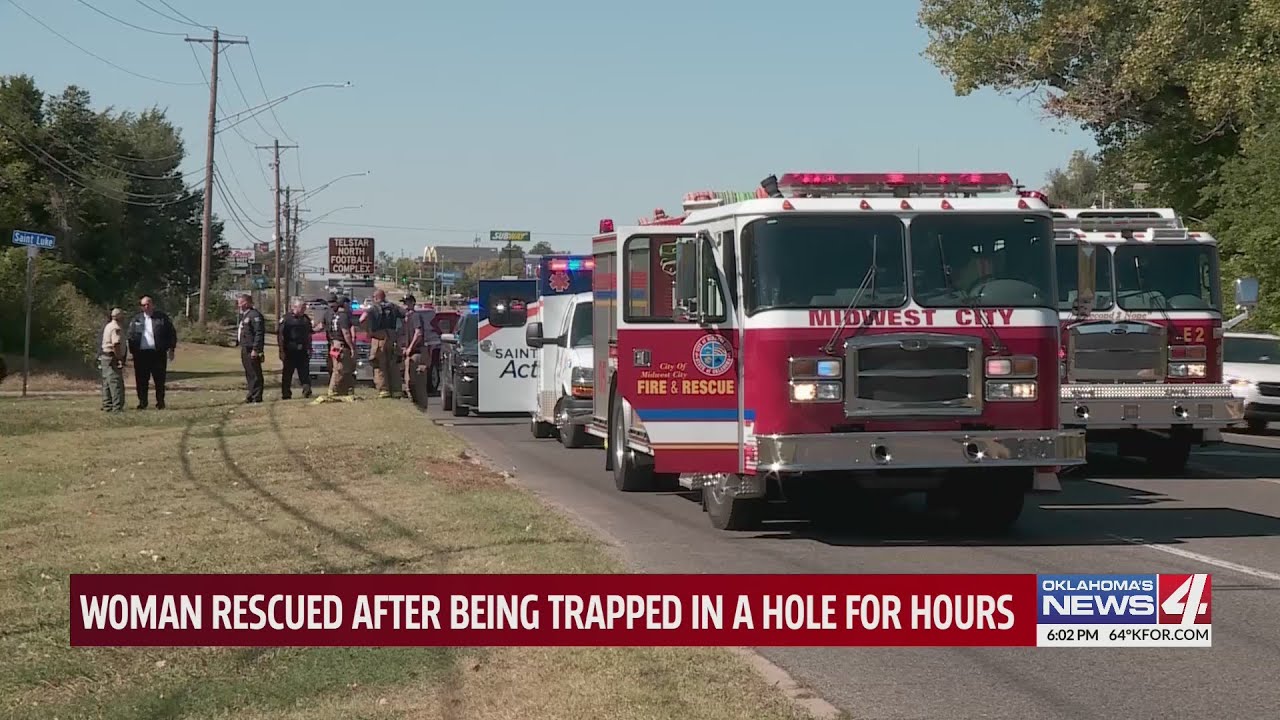 Woman rescued after being trapped in a hole for hours - YouTube