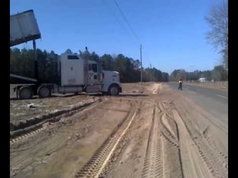 Kenworth truck stuck in sandy field - YouTube