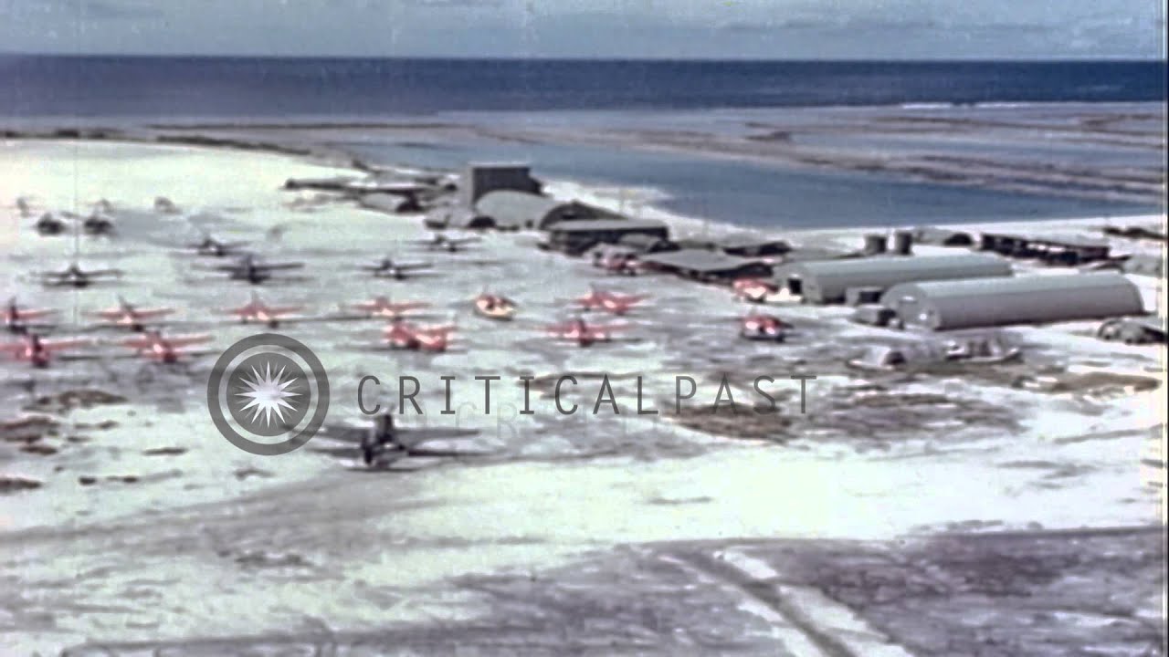 Planes parked in a row for Operation Crossroads at Bikini Atoll in the ...