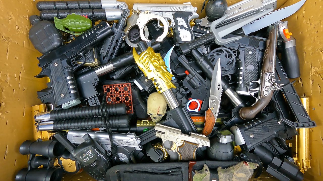 A Cardboard Box of Toy Guns And Guns Will Destroy Everything! Toy ...