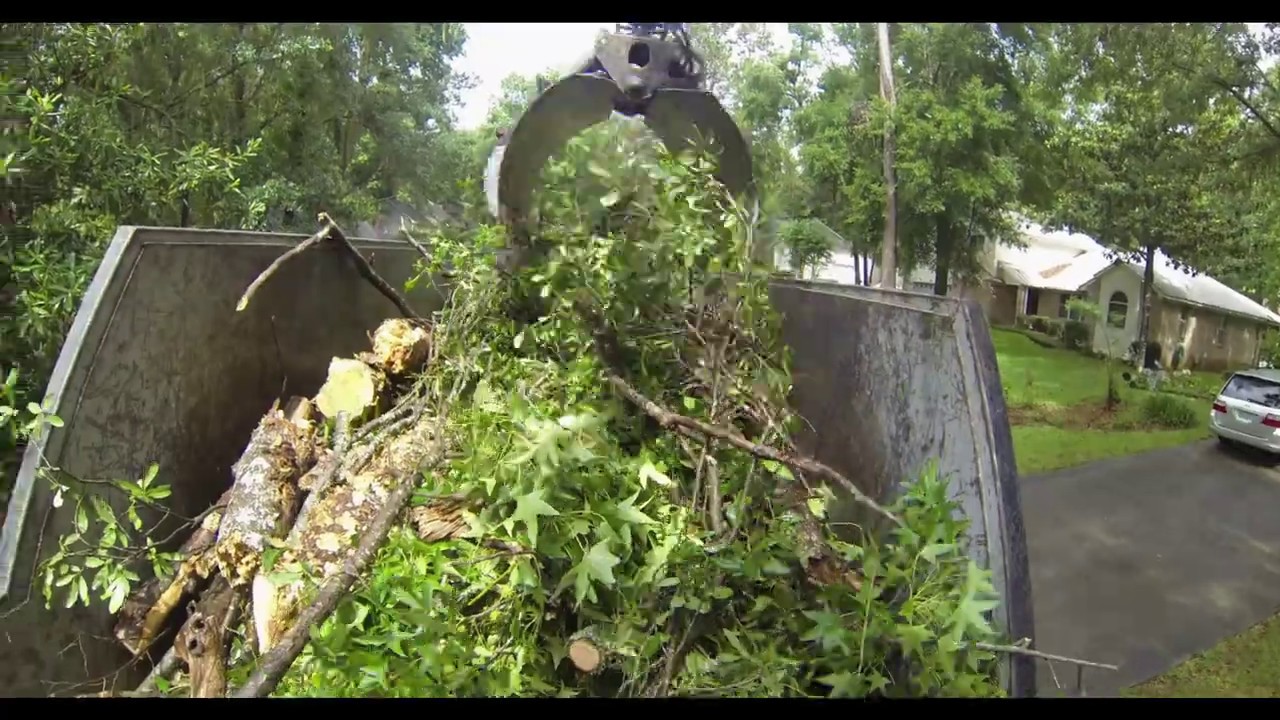 Tree Debris Hauling Truck Grapple Truck Gets It!!! - YouTube