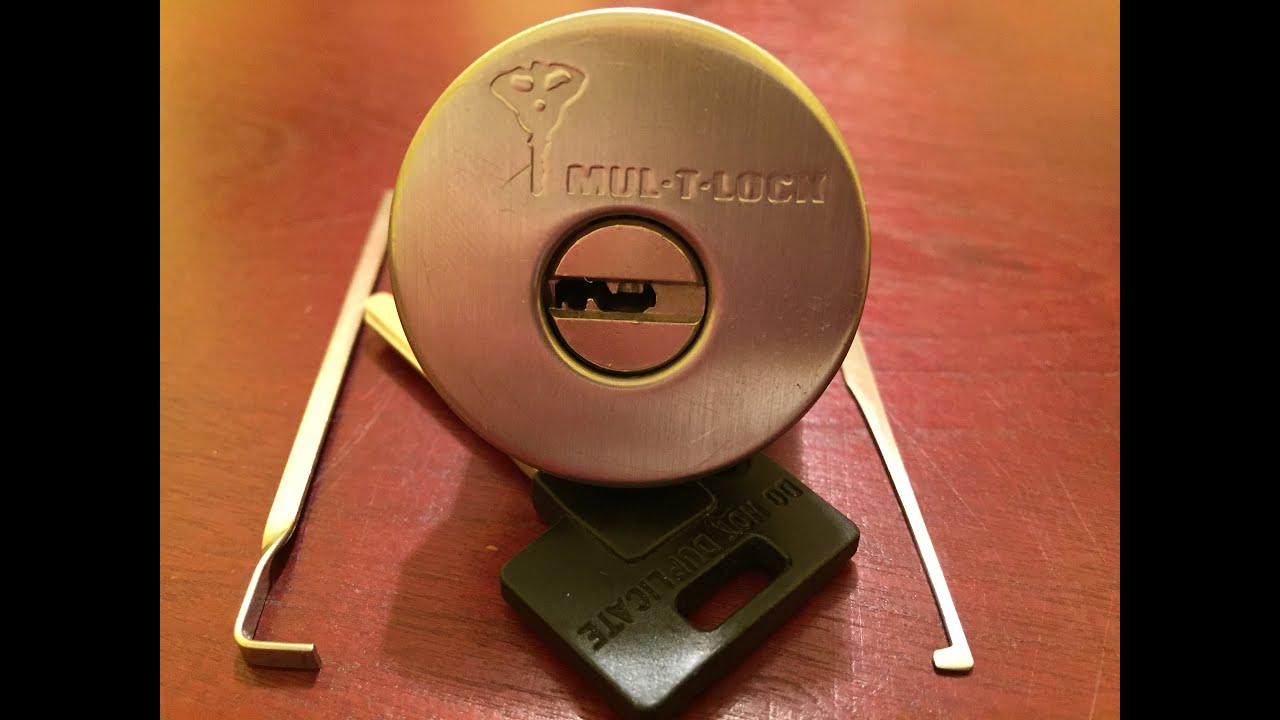 Mul T Lock First Generation w. Serrated Pins Picked - YouTube
