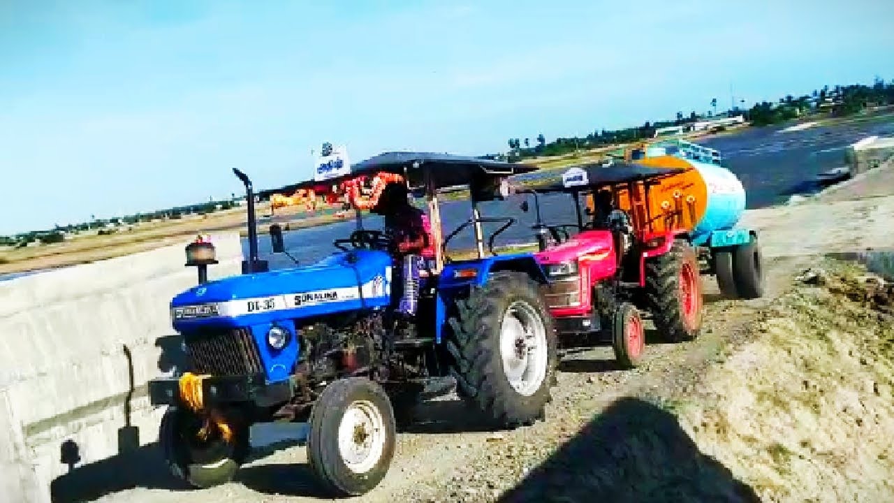 Mahindra yuvo575 DI tractor pulling the water tank in very height ...